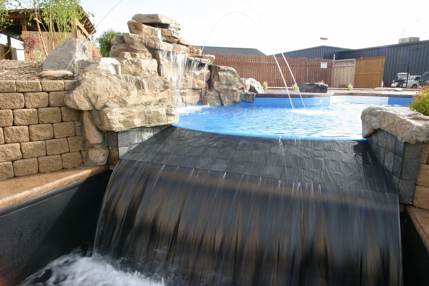 20 Awesome Infinity Pool Designs With Waterfalls - Housely