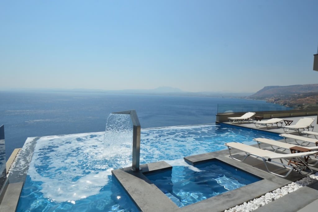 20 Awesome Infinity Pool Designs With Waterfalls - Housely