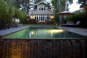 20 Awesome Infinity Pool Designs With Waterfalls - Housely