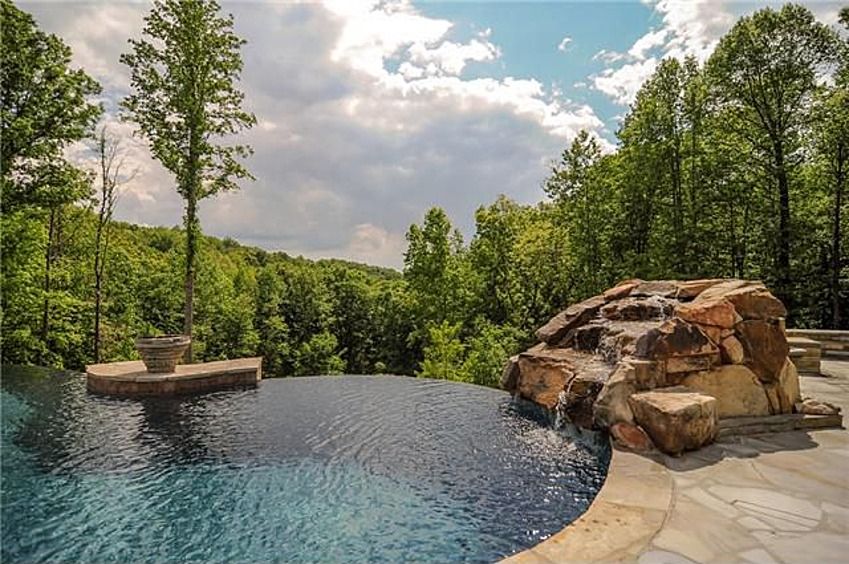 20 Awesome Infinity Pool Designs With Waterfalls - Housely