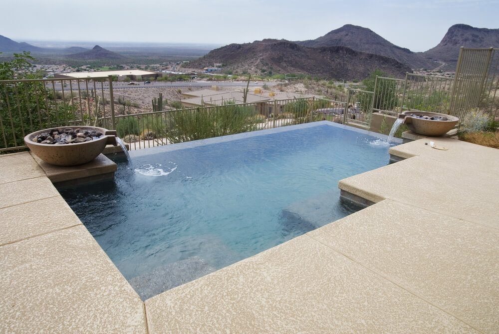 20 Awesome Infinity Pool Designs With Waterfalls - Housely