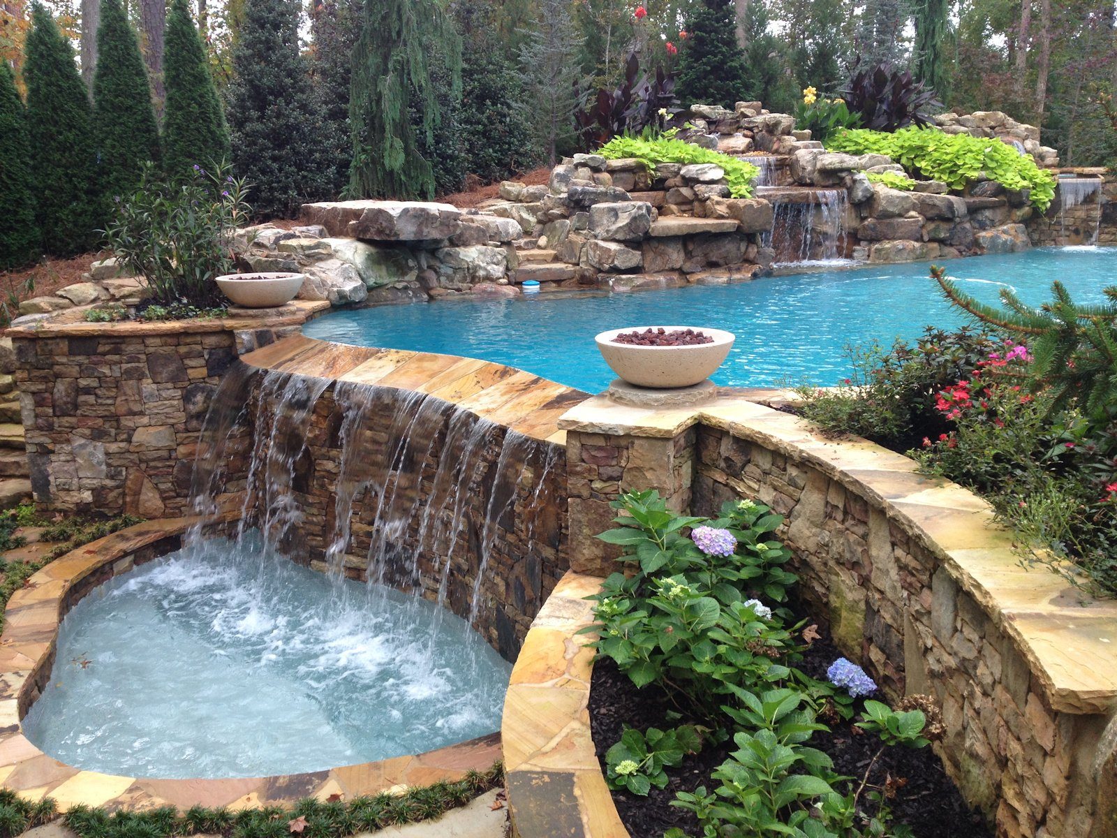 20 Awesome Infinity Pool Designs With Waterfalls - Housely